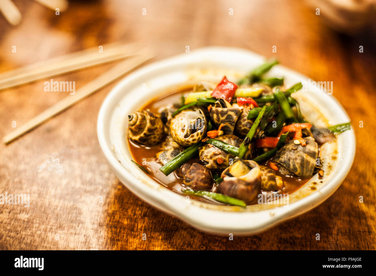 Escargot at a restaurant Stock Photo - Alamy