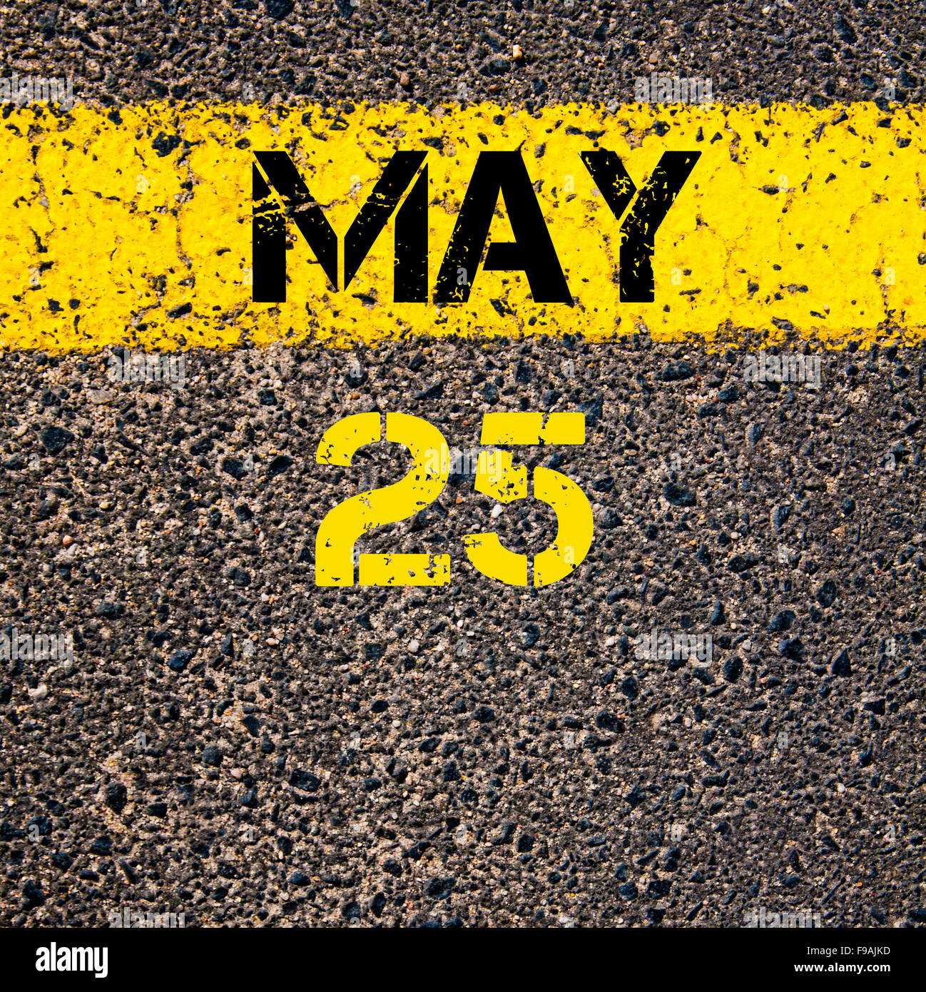 25 May calendar day written over road marking yellow paint line Stock ...