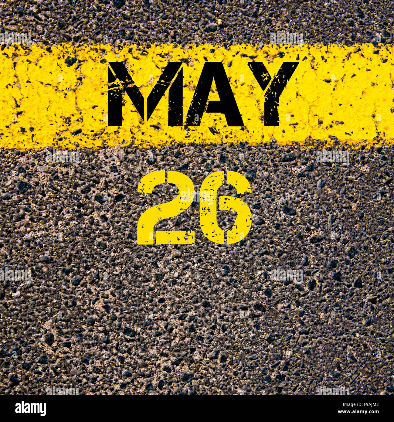 26 May calendar day written over road marking yellow paint line Stock ...