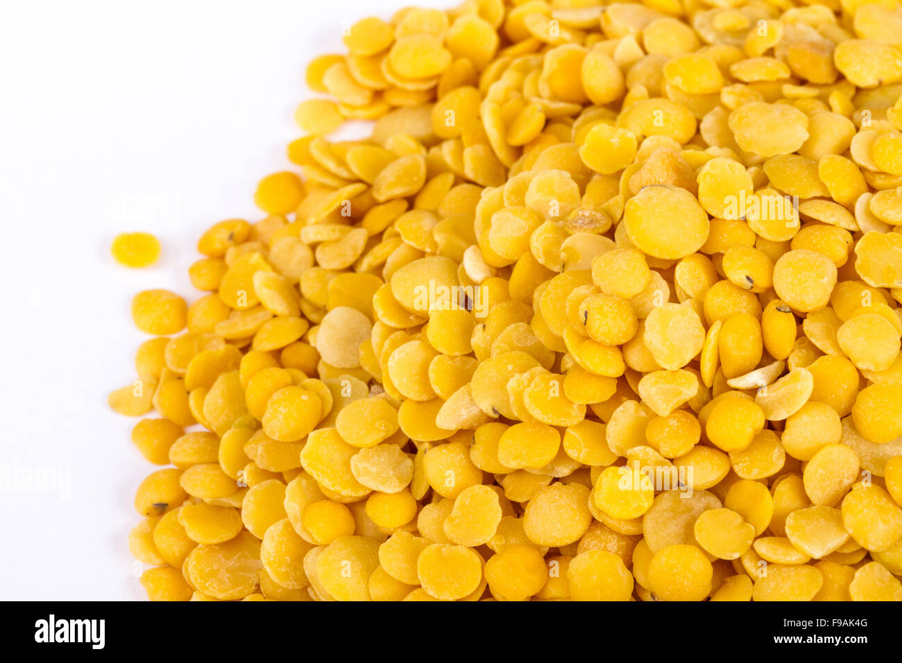 Yellow lentils isolated on white background.Macro shot Stock Photo - Alamy