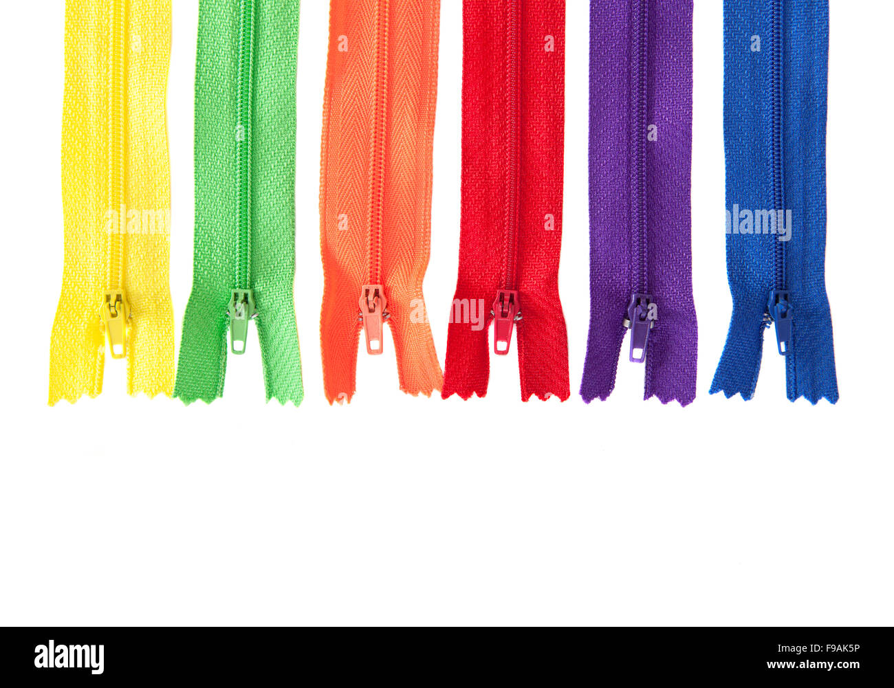different colorful zippers in front of white background, isolated Stock ...