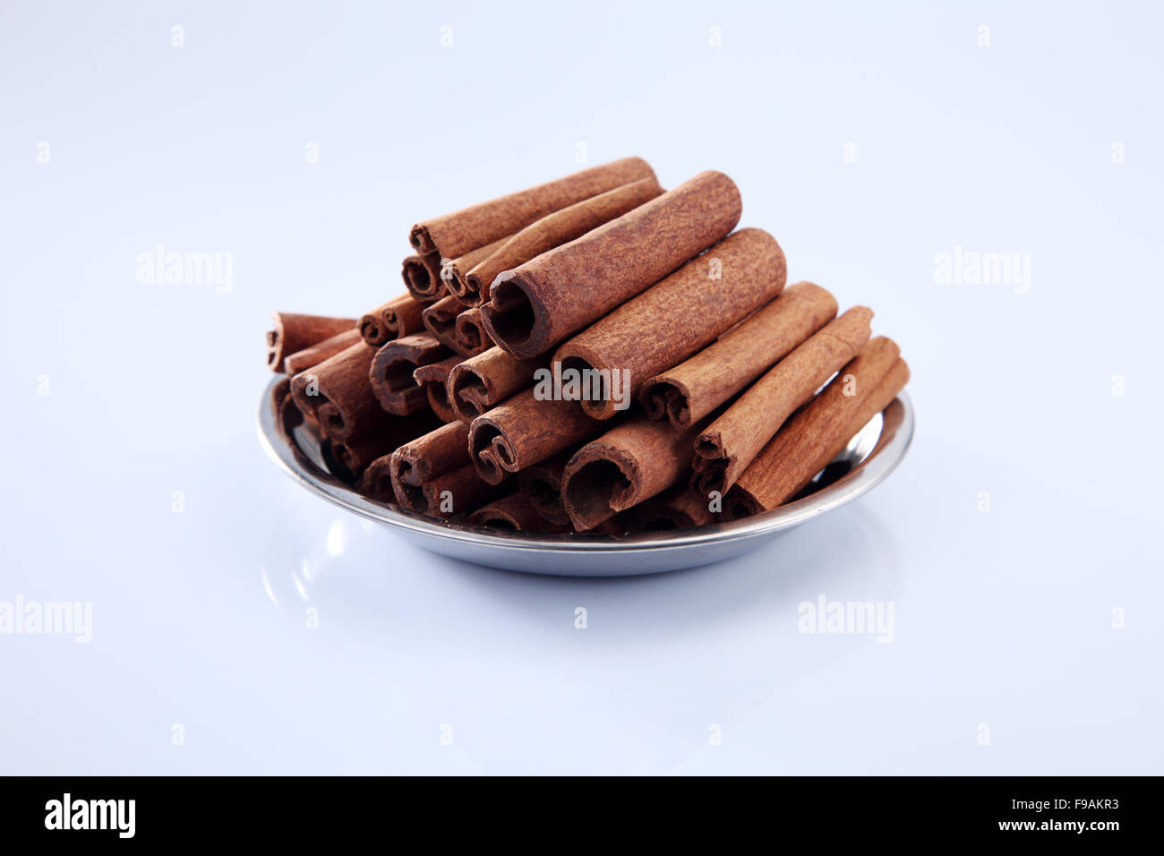 cinnamon stick on the silver container Stock Photo - Alamy