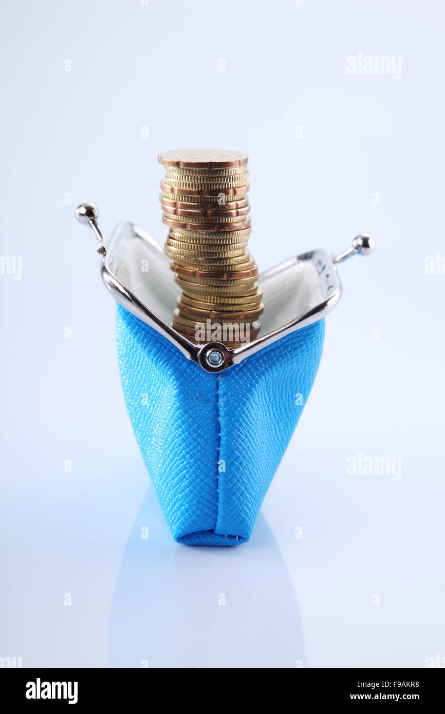 coins in the blue color purse Stock Photo - Alamy