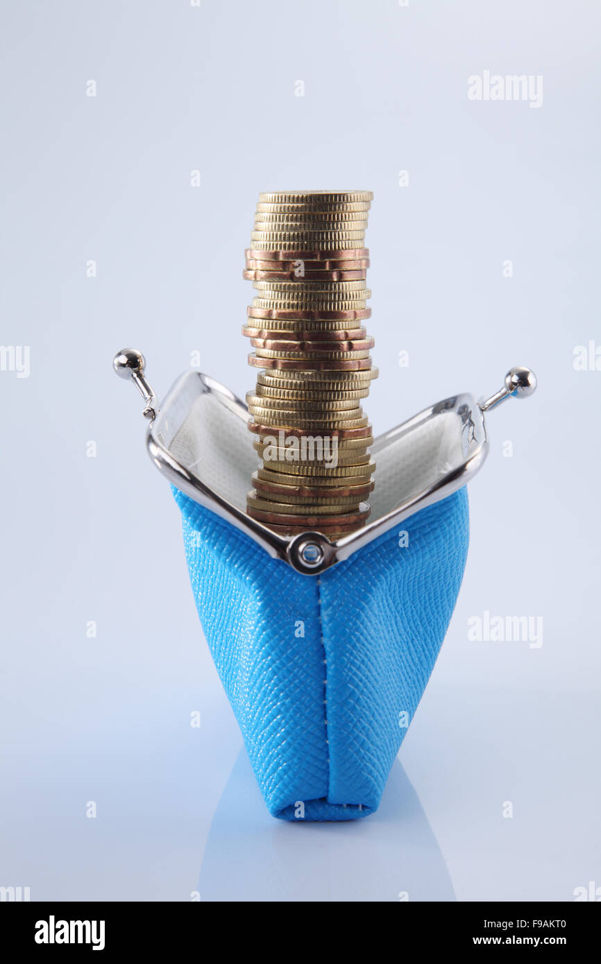 coins in the blue color purse Stock Photo - Alamy