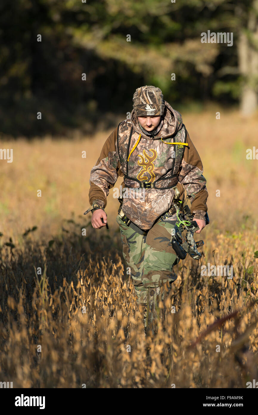 A young Bowhunter going out hunting Stock Photo - Alamy