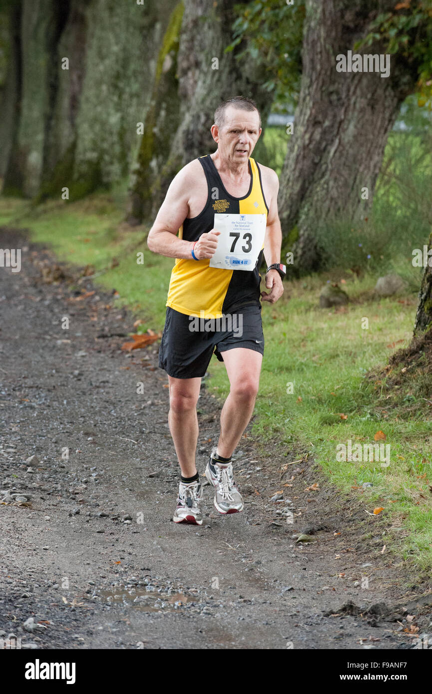 Elderly man running in marathon hi-res stock photography and images - Alamy