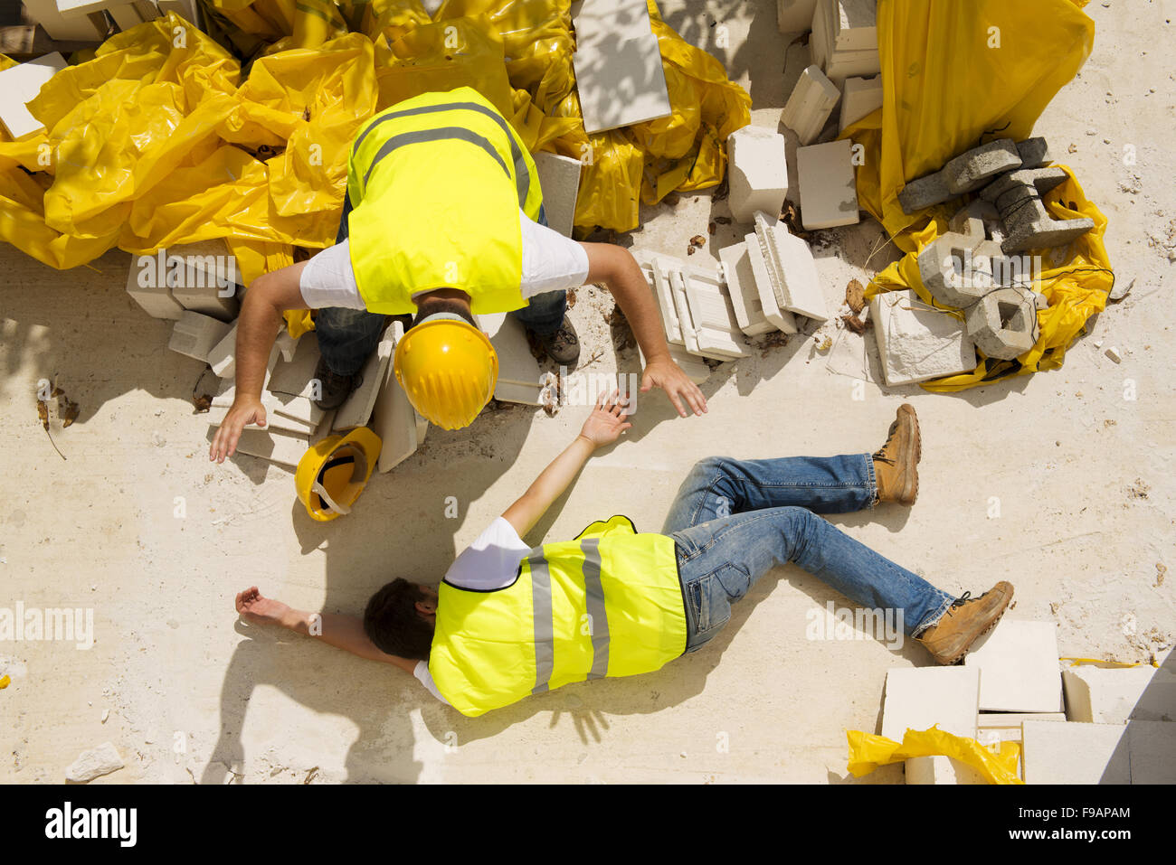 Construction worker has an accident while working on new house Stock ...