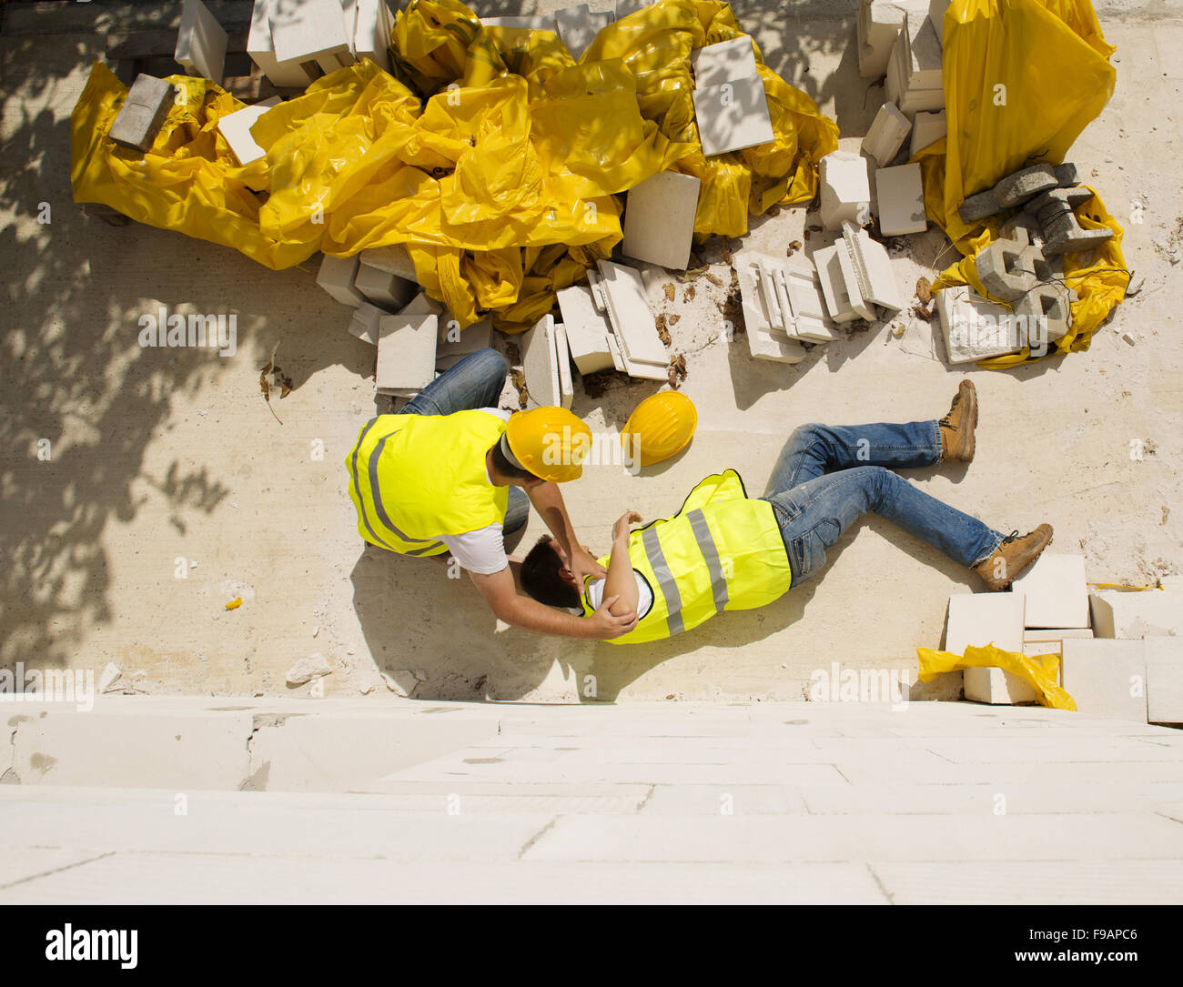 Construction worker has an accident while working on new house Stock ...