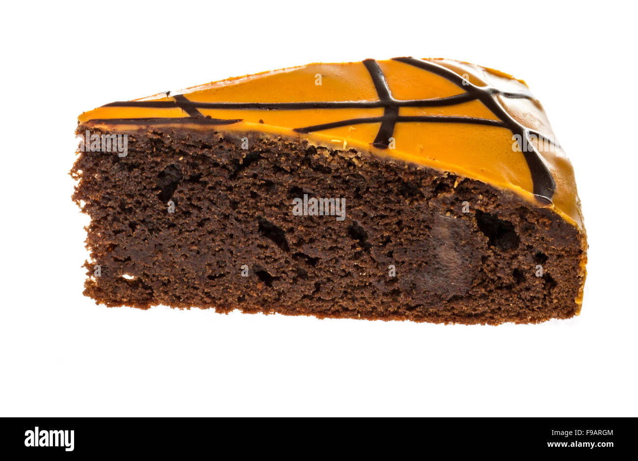 Piece of chocolate cake with icing on white isolated background Stock ...