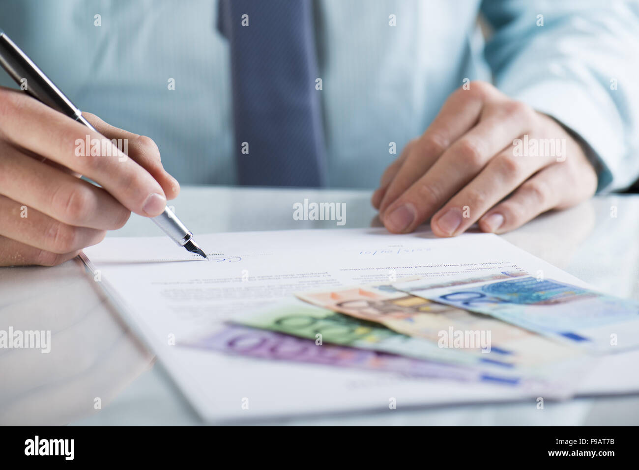 Businessman is signing a contract, business contract details Stock ...