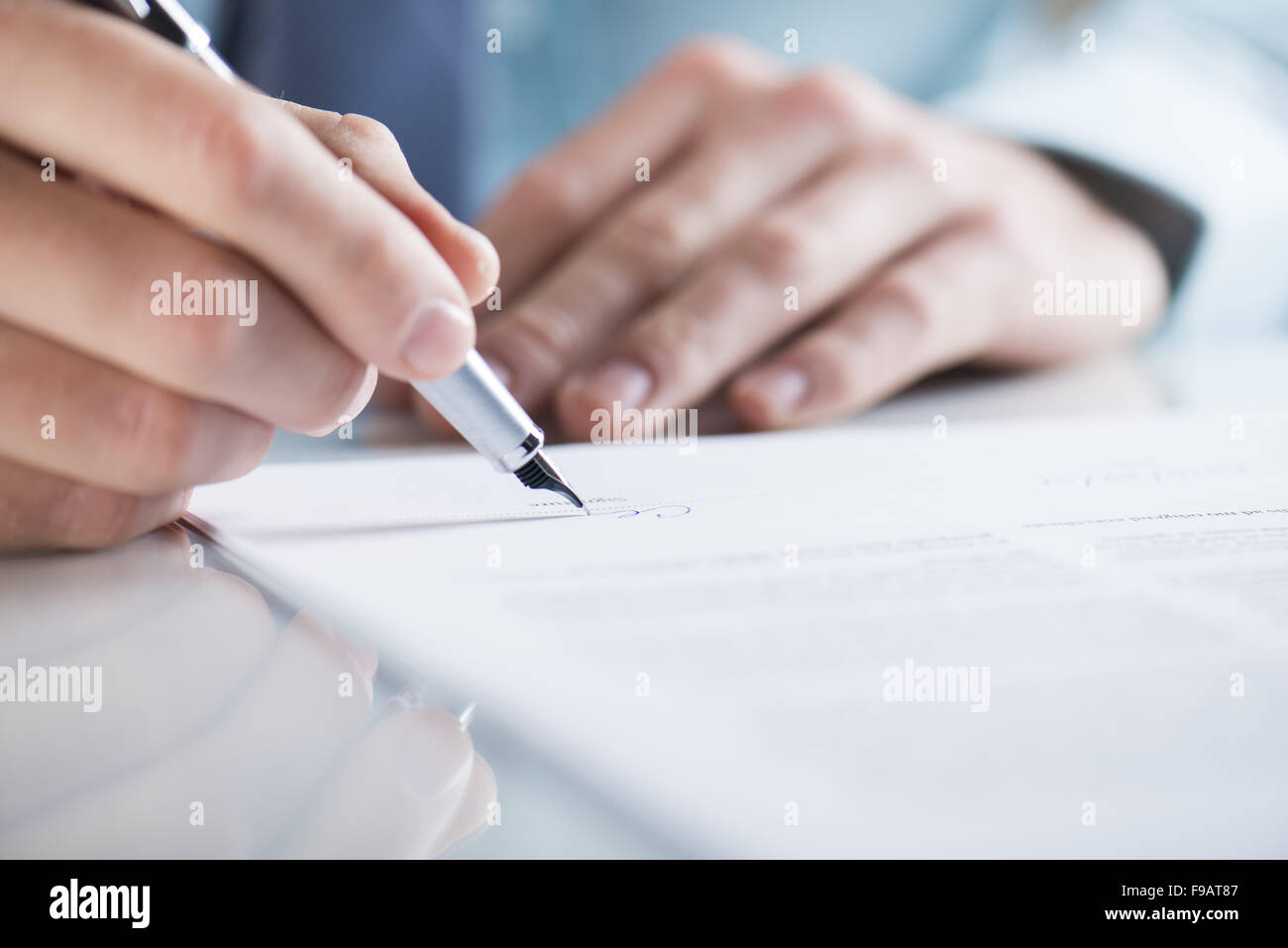 Businessman is signing a contract, business contract details Stock ...