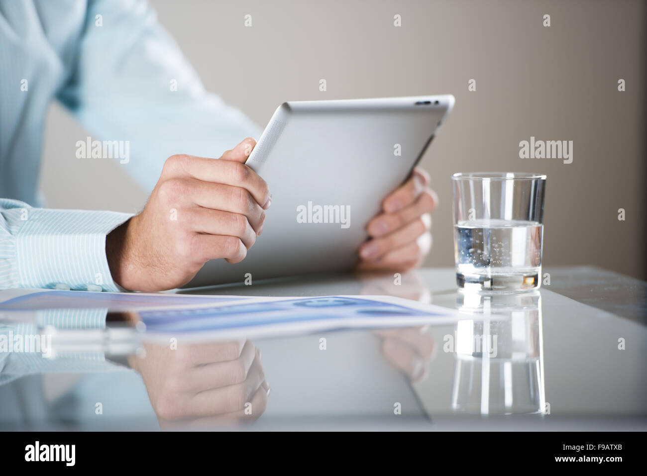 Business people reading graphs and charts Stock Photo - Alamy