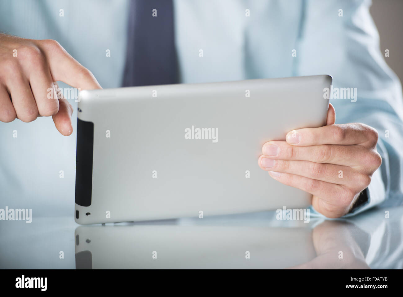 Business people reading graphs and charts Stock Photo - Alamy