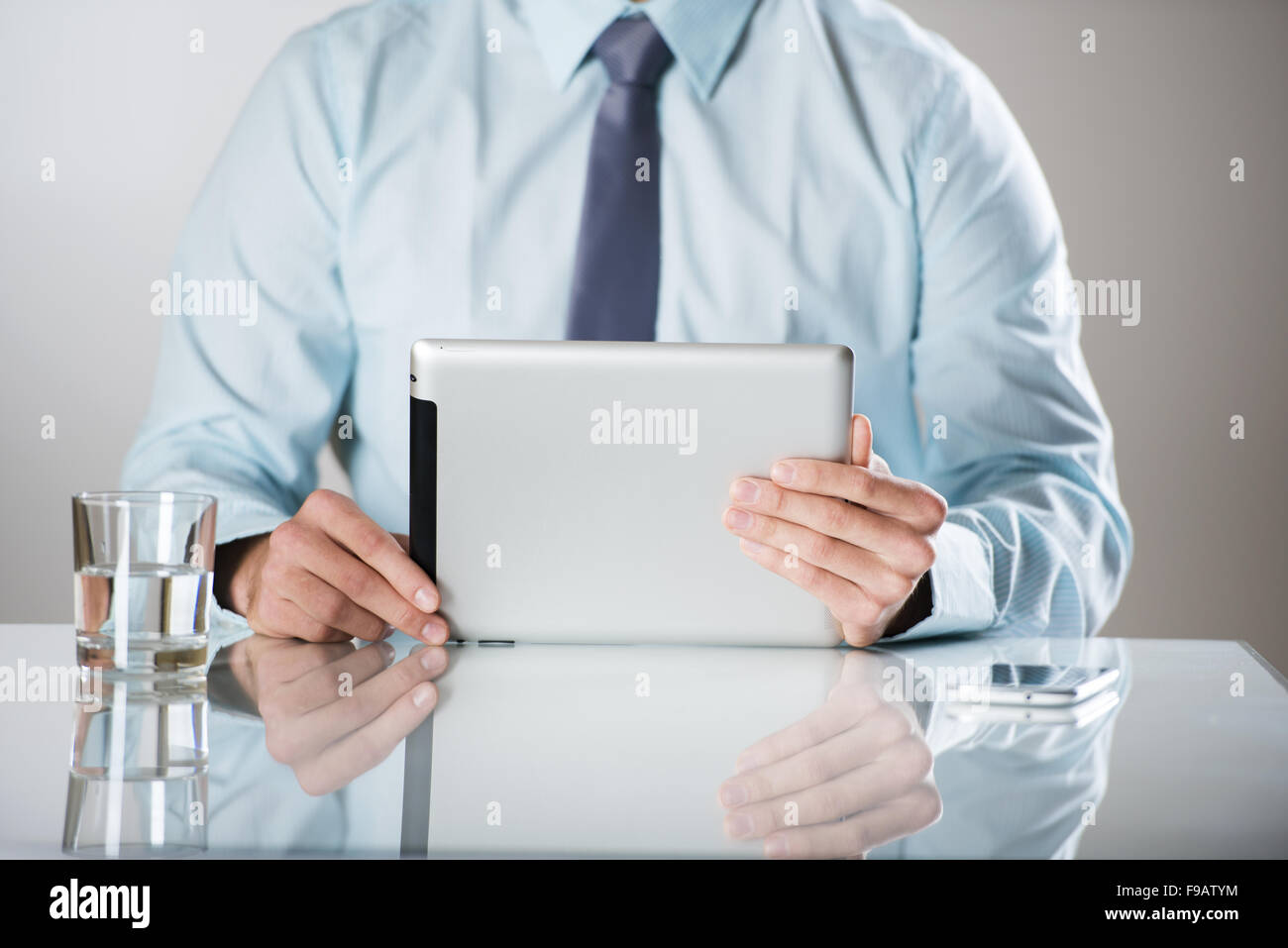 Business people reading graphs and charts Stock Photo - Alamy