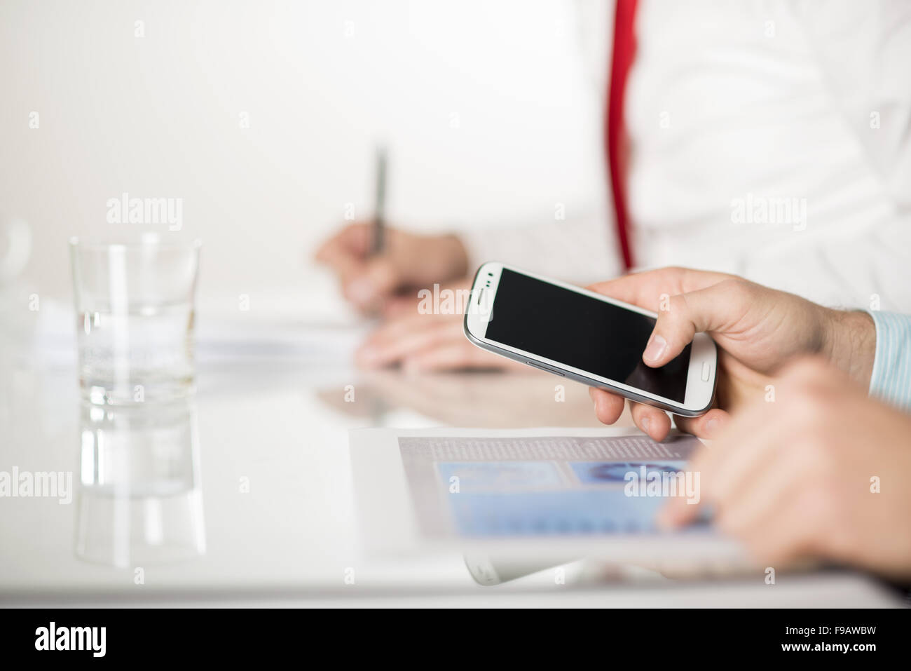 Business people reading graphs and charts Stock Photo - Alamy