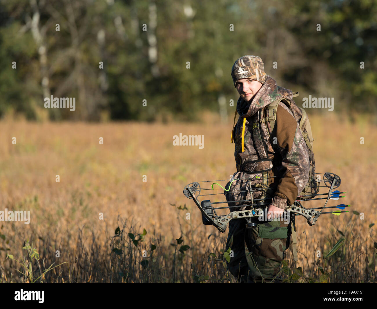 A young Bowhunter going out hunting Stock Photo - Alamy