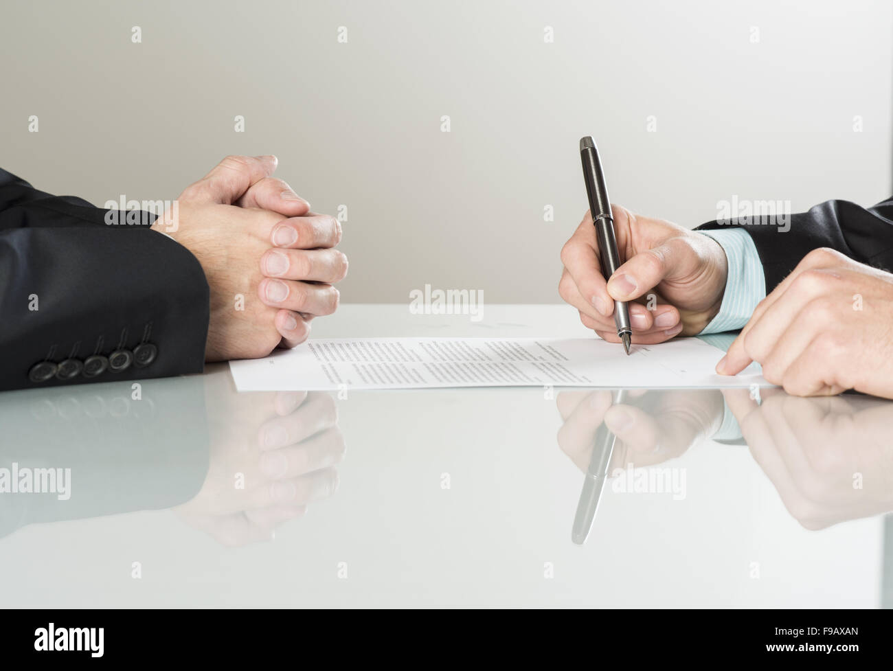 Businessmen are signing a contract, business contract details Stock ...