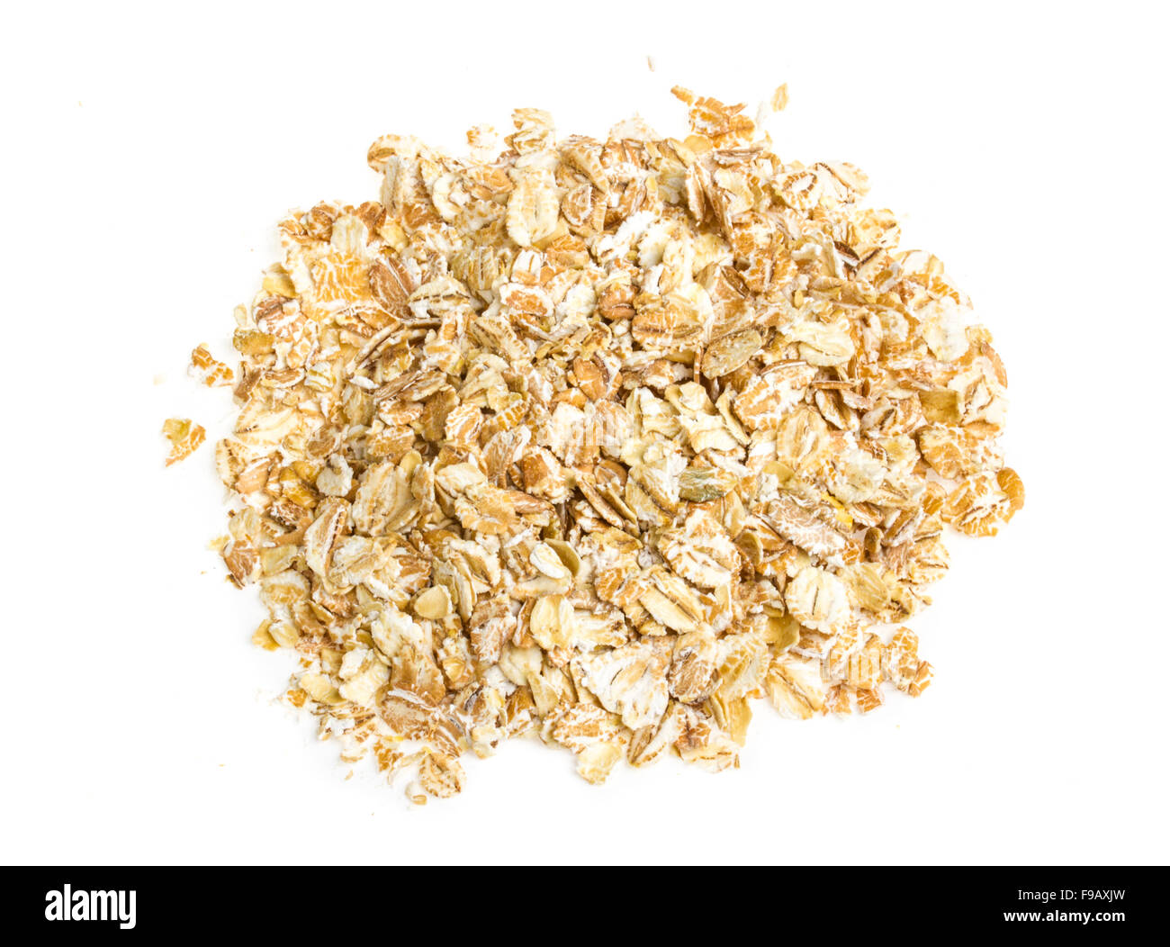 Heap of dry rolled oats isolated on white background Stock Photo - Alamy