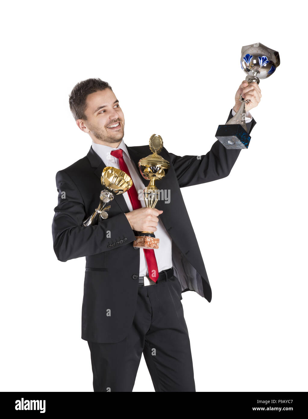 Successful business man is celebrating success on isolated white ...
