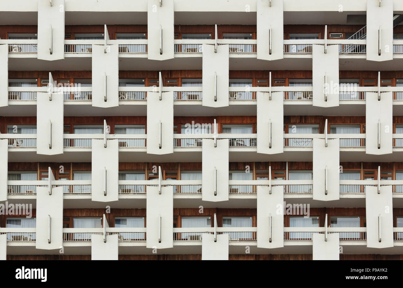 Background of the facade. Repeating pattern of windows and balcony ...