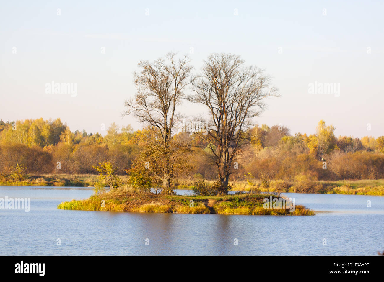 Colorful autumn trees fortress at the river front Stock Photo - Alamy