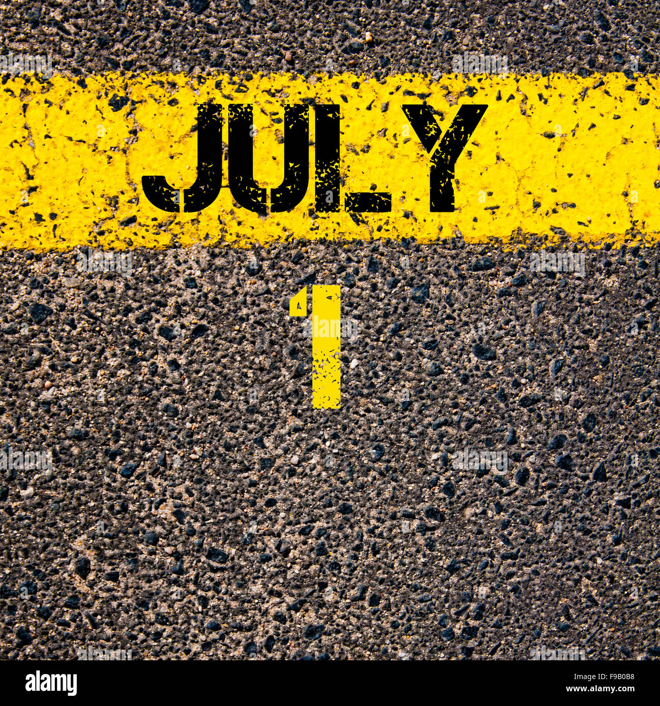 1 July calendar day written over road marking yellow paint line Stock ...