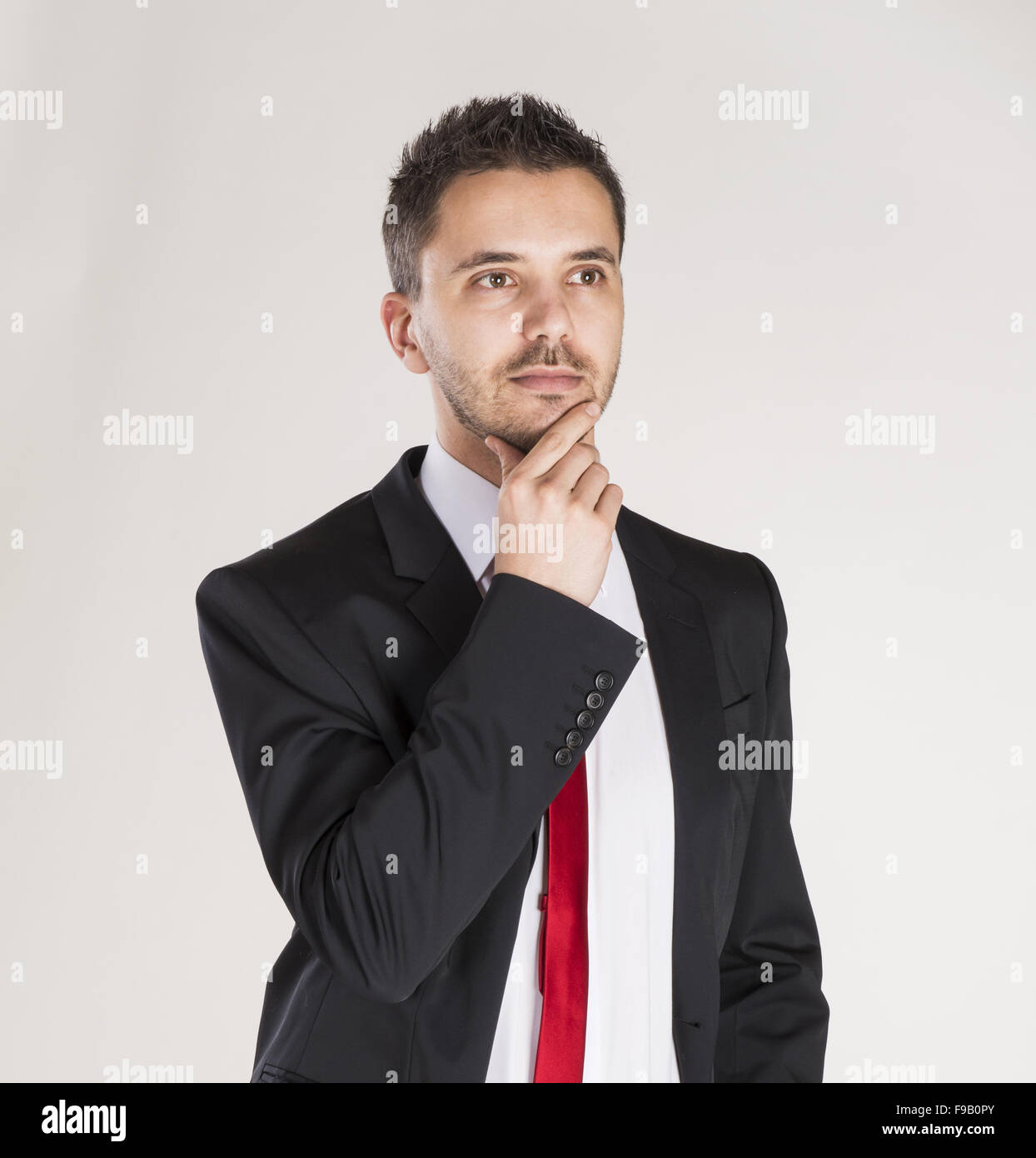 Successful business man is standing on isolated white background Stock ...