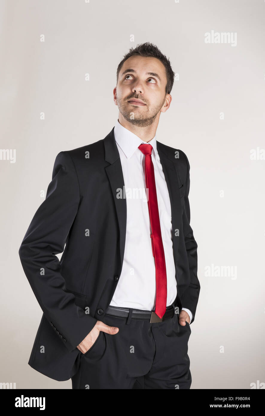 Successful business man is standing on isolated white background Stock ...