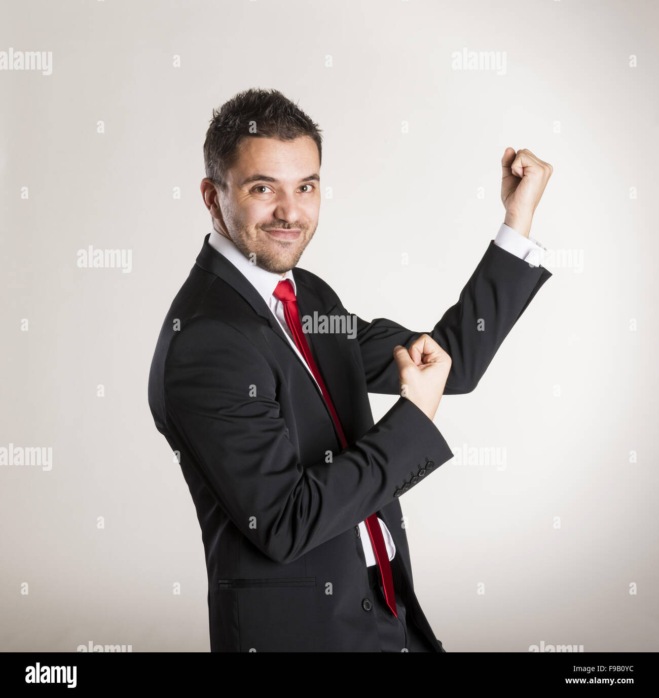 Successful business man is standing on isolated white background Stock ...