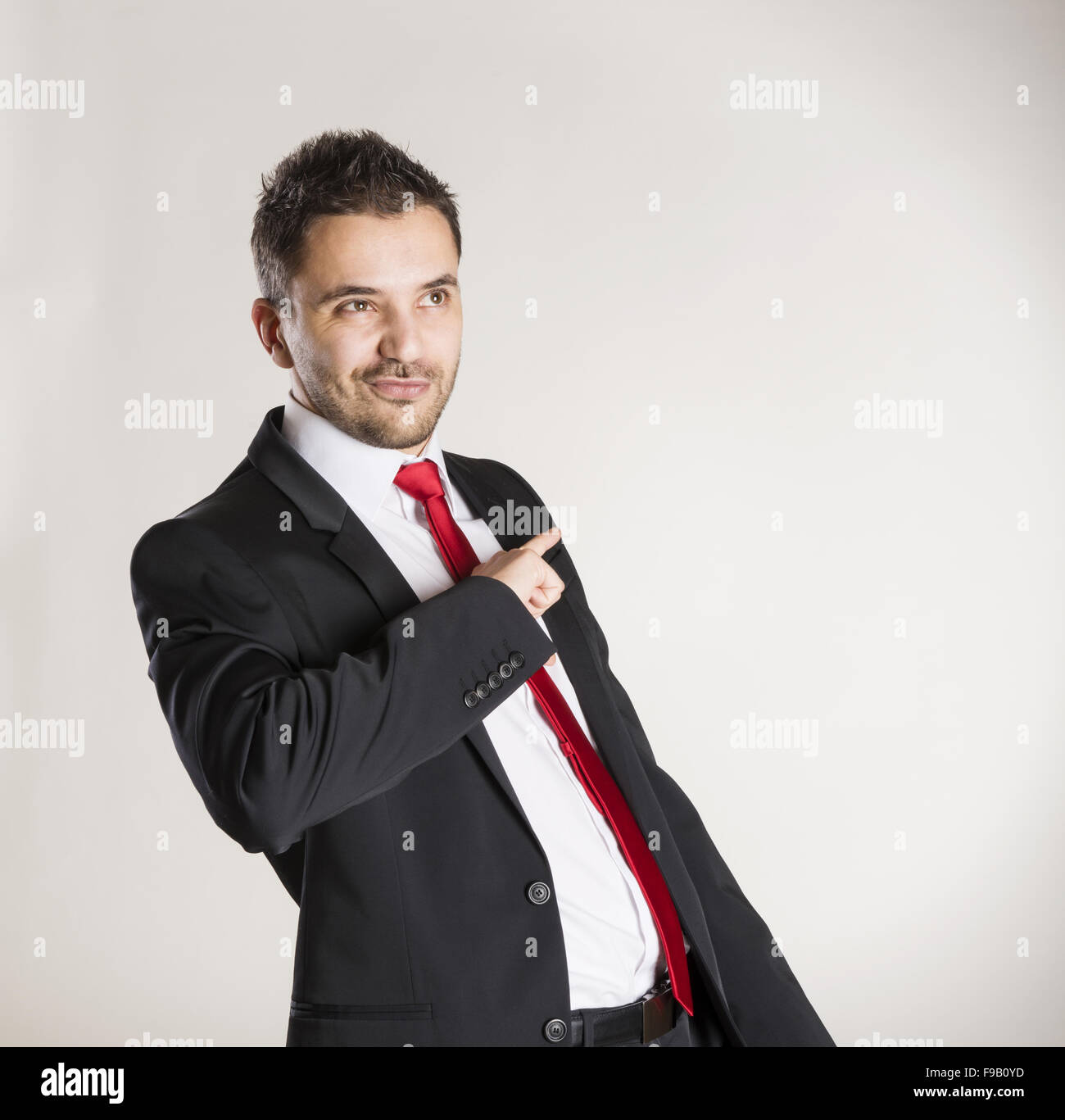 Successful business man is standing on isolated white background Stock ...