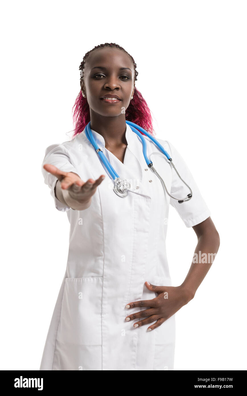 Happy smiling young beautiful female doctor showing blank area ... Happy smiling young beautiful female doctor showing blank area ...