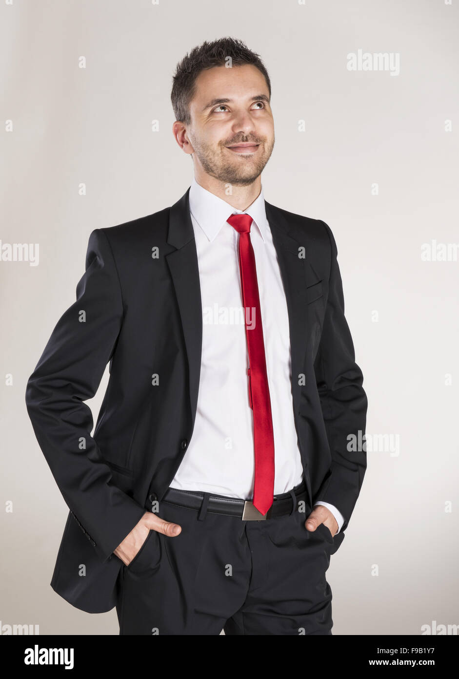 Successful business man is standing on isolated white background Stock ...