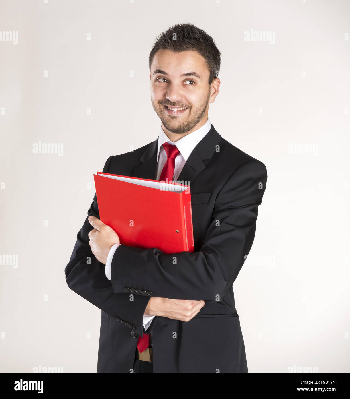 Successful business man is standing on isolated white background Stock ...