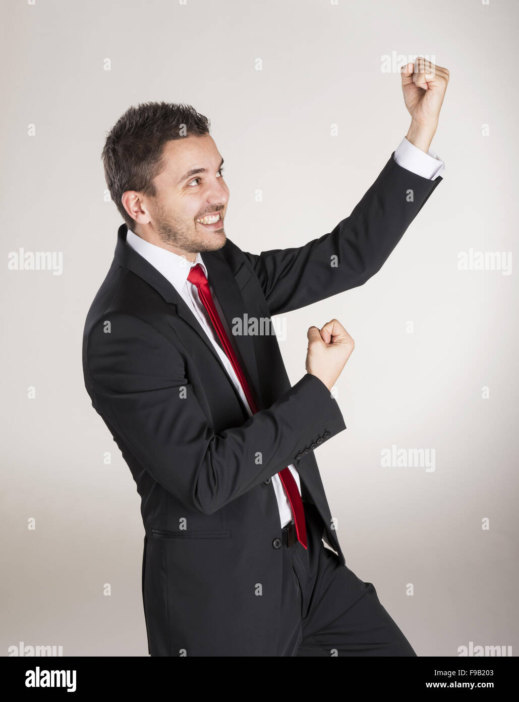 Successful business man is standing on isolated white background Stock ...