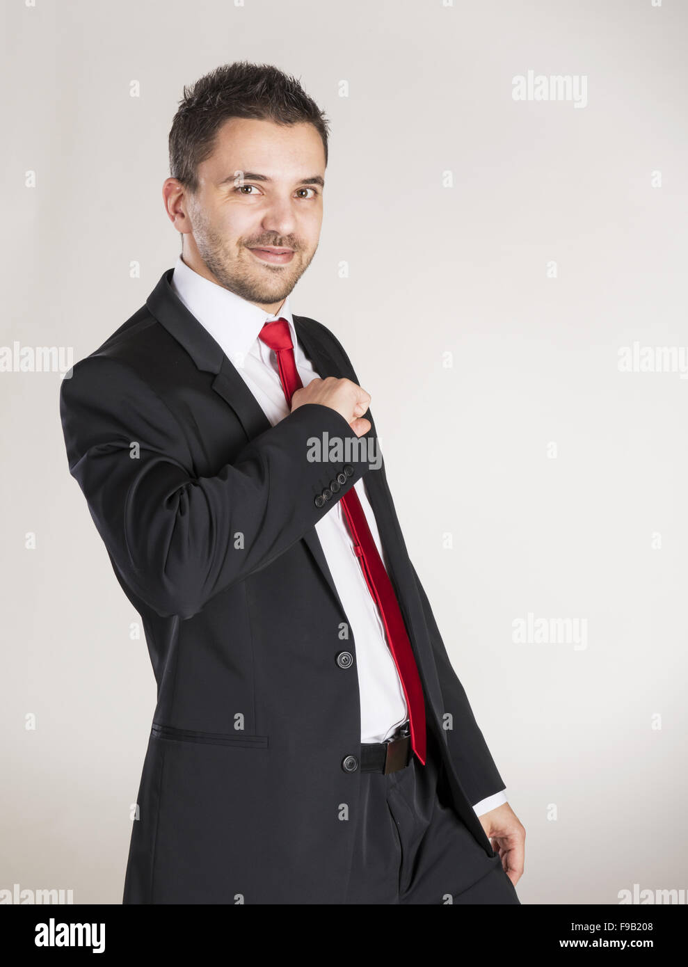 Successful Business Man Is Standing On Isolated White Background Stock
