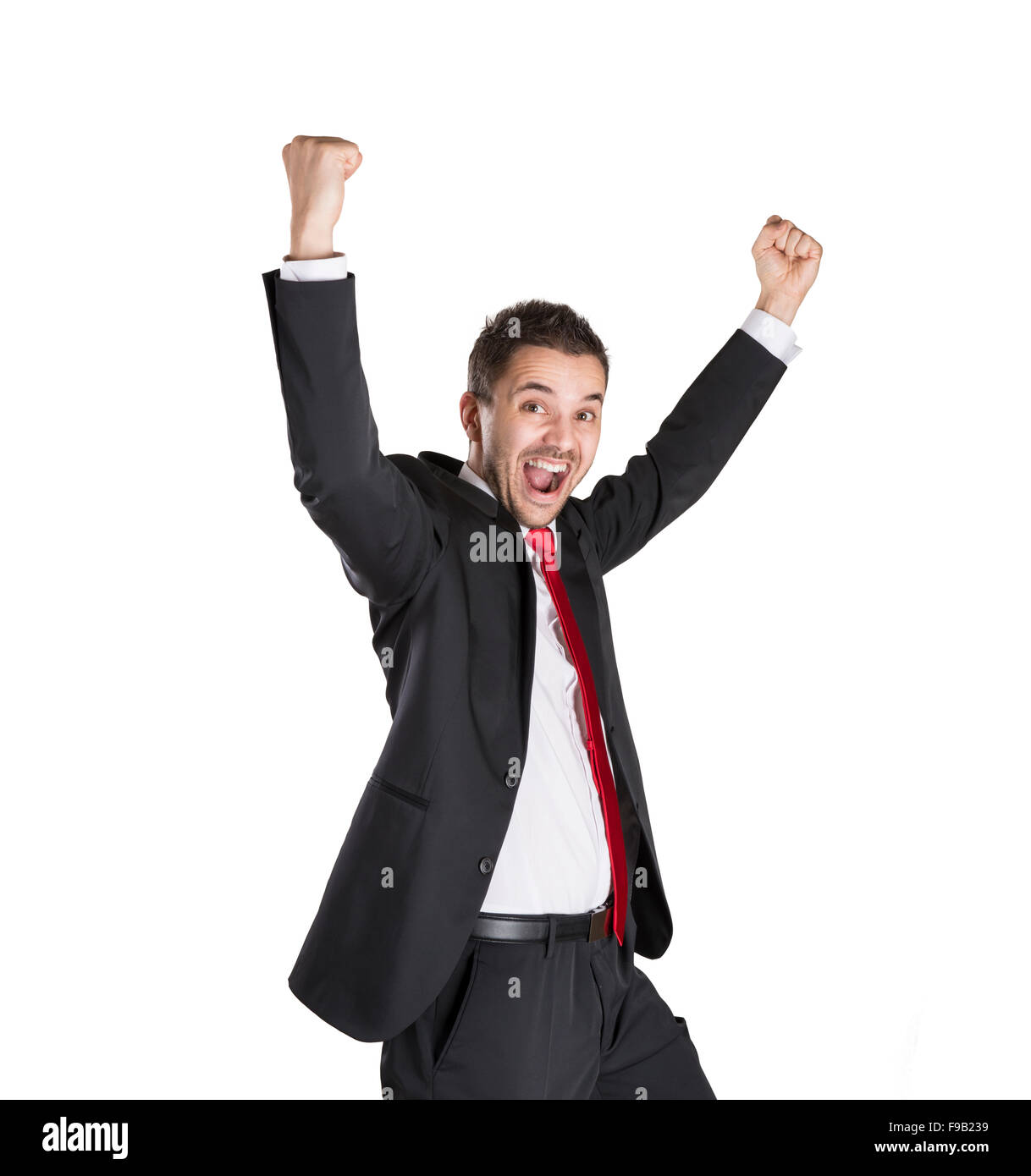 Successful business man is celebrating on isolated white background ...