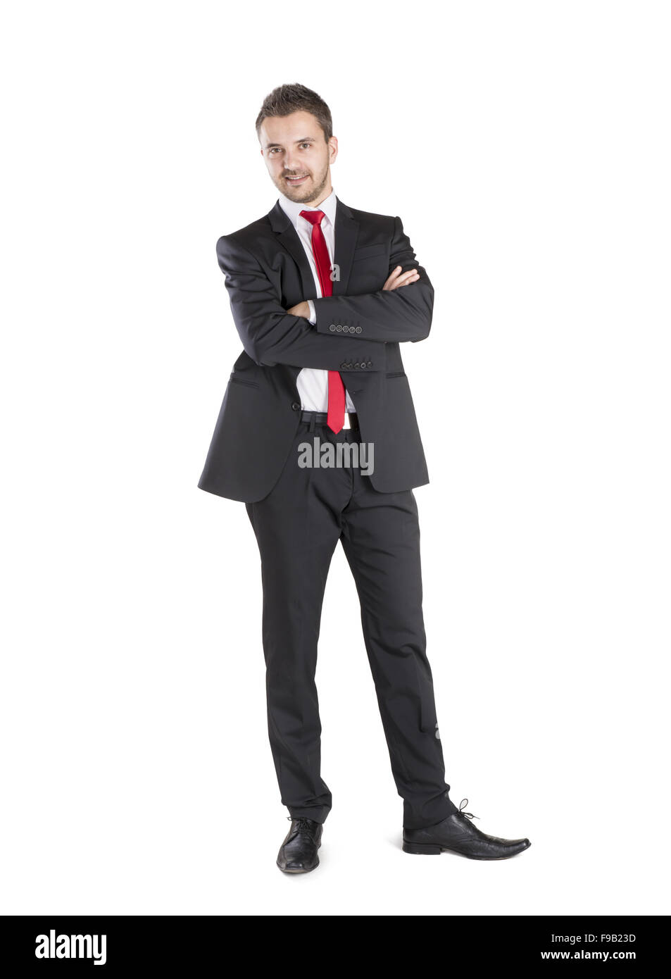 Successful business man is standing on isolated white background Stock ...
