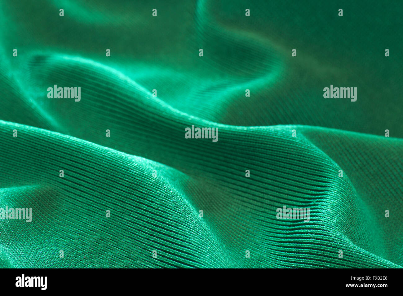 Green textile background Stock Photo - Alamy