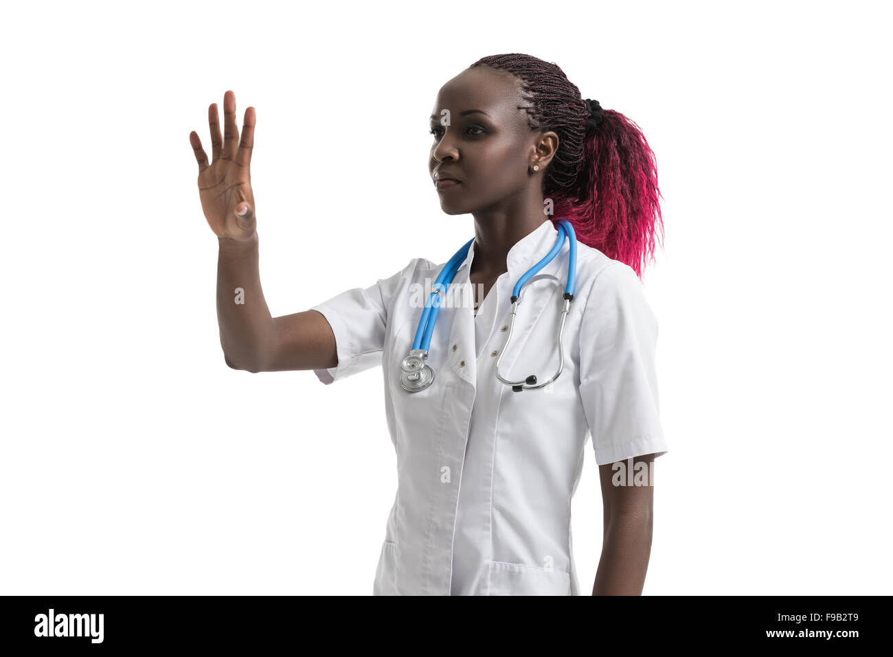Female african doctor with stethoscope working with virtual screen ...