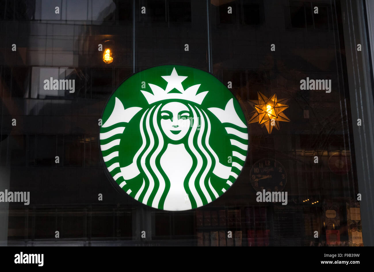 Starbucks icon in a coffee house window seen from the street Stock ...