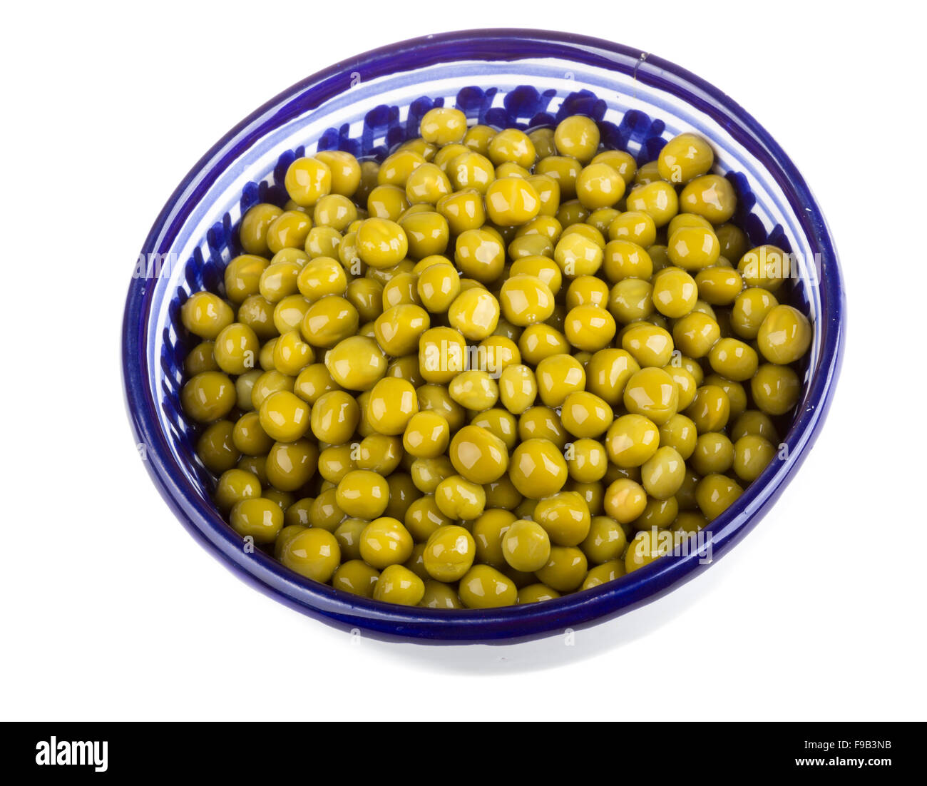 green peas, in a bowl, isolated, white background Stock Photo - Alamy