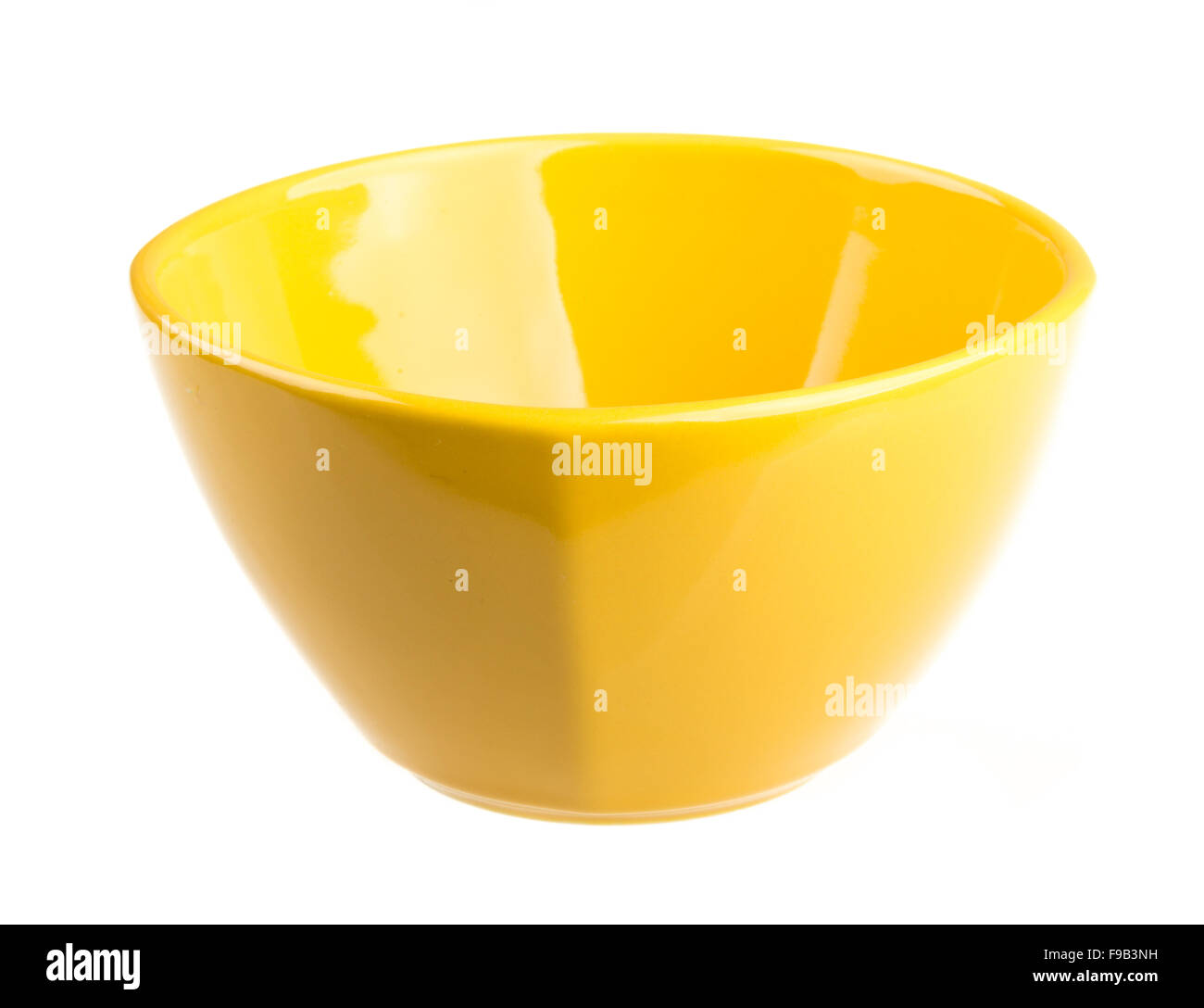 Empty yellow plate Stock Photo - Alamy