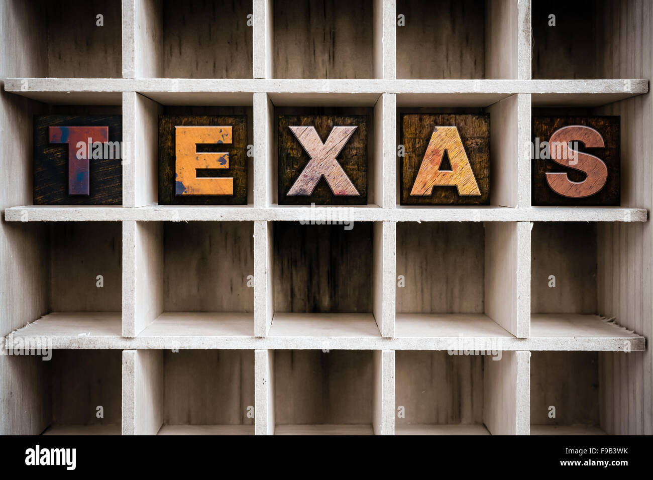 The word "TEXAS" written in vintage ink stained wooden letterpress type ...