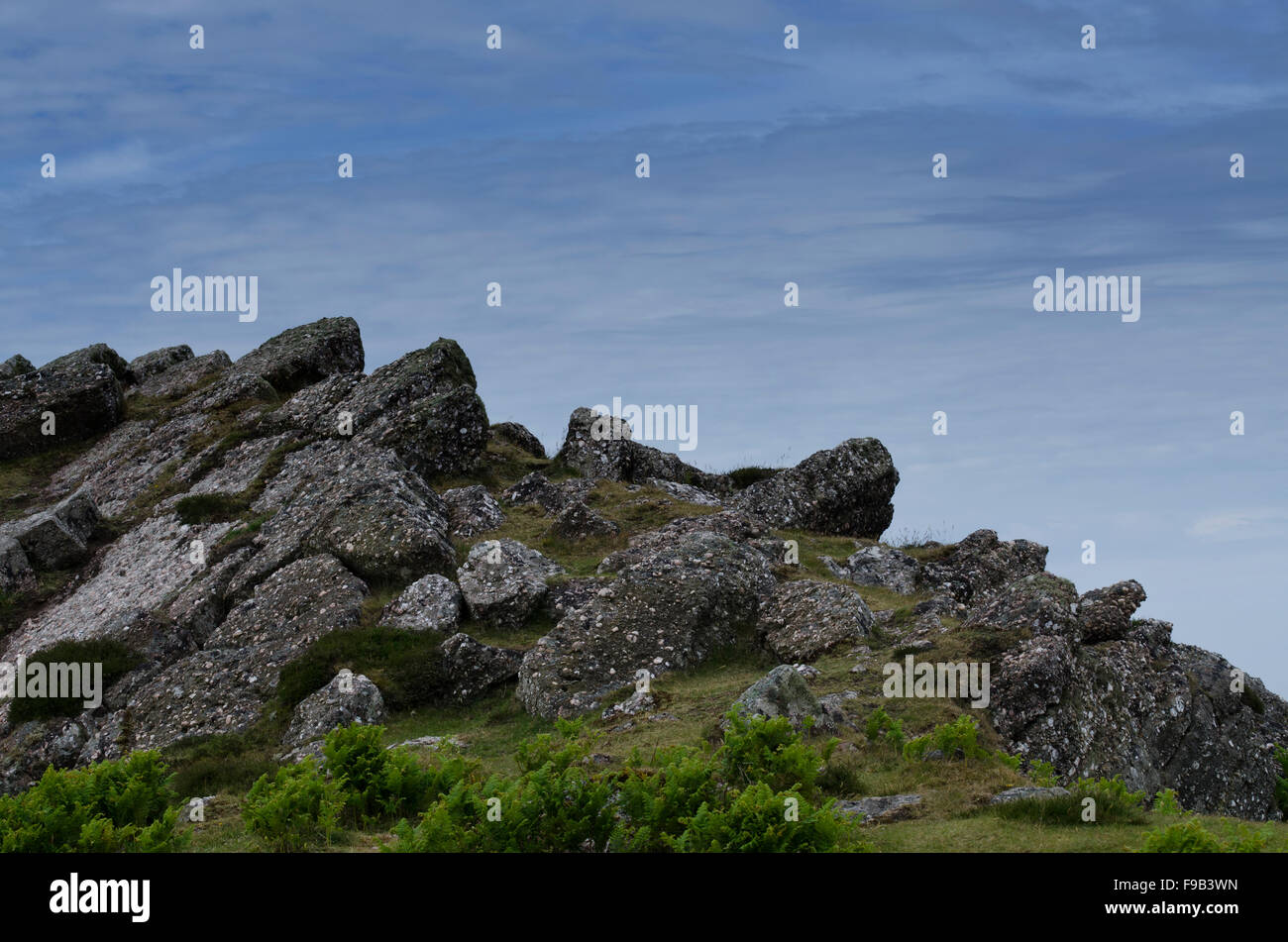Cliff edge open to sky. Rocks and boulders on diagonal over open sky view Stock Photo - Alamy