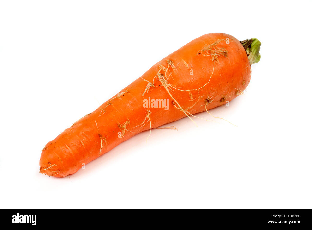 Fresh red carrot on white background Stock Photo - Alamy