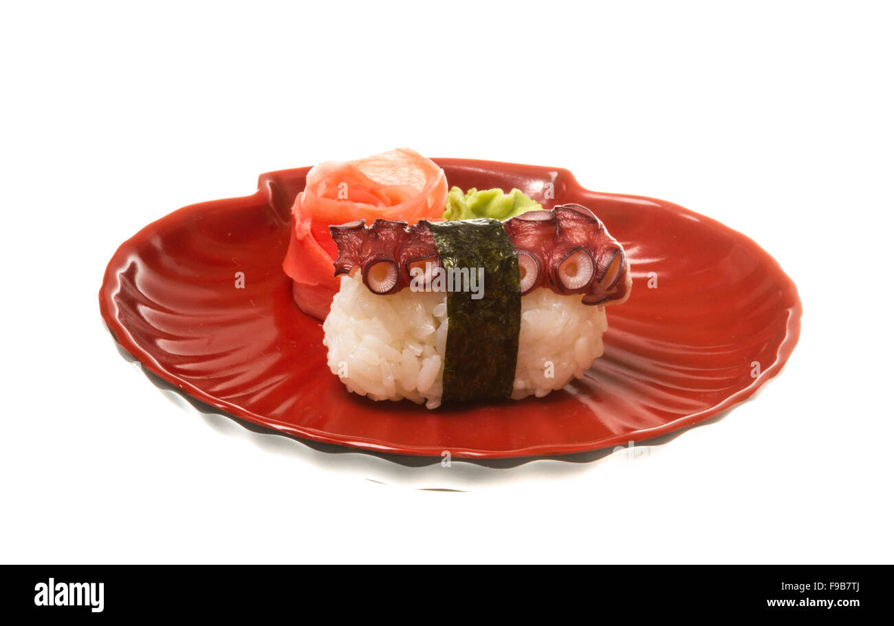 Japanese sushi with meat octopus on a white background Stock Photo - Alamy