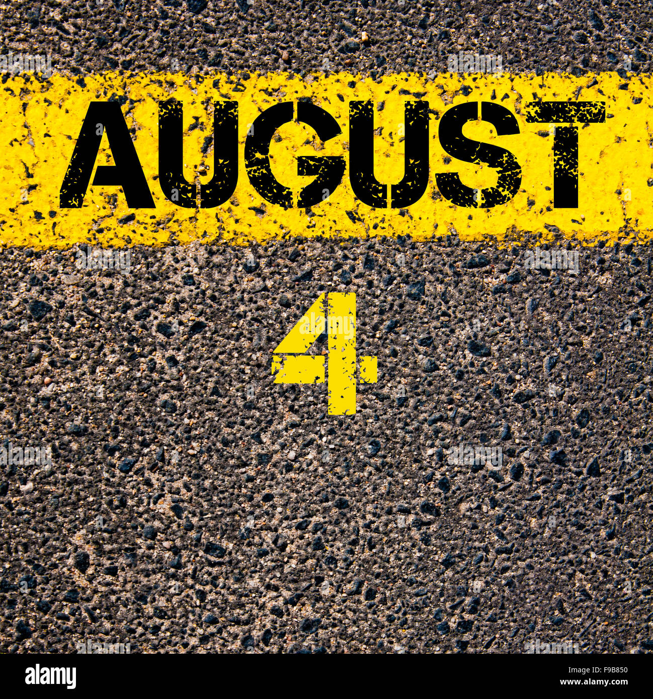 4 August calendar day written over road marking yellow paint line Stock ...