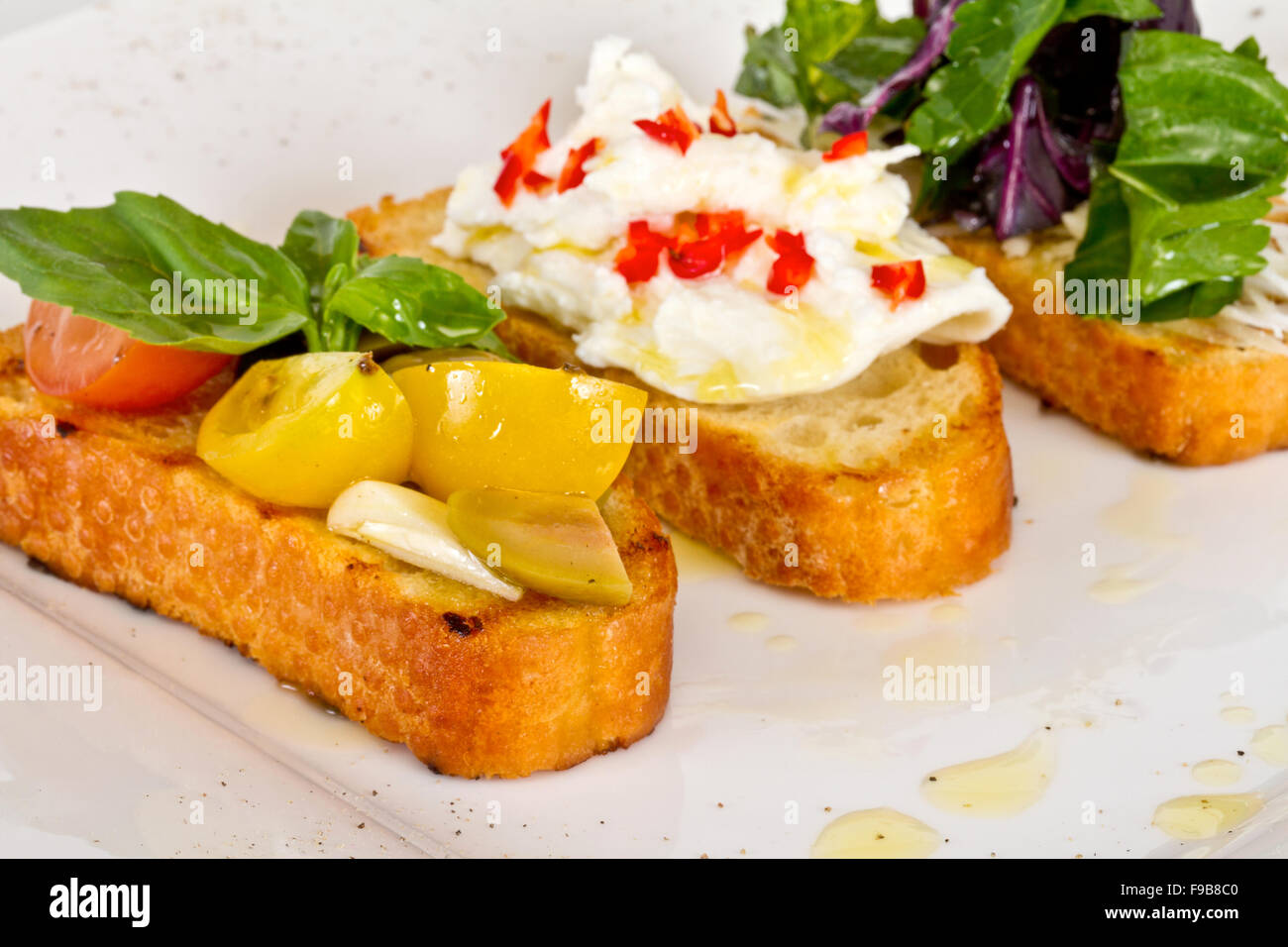 different colored Canapes on a white background Stock Photo - Alamy