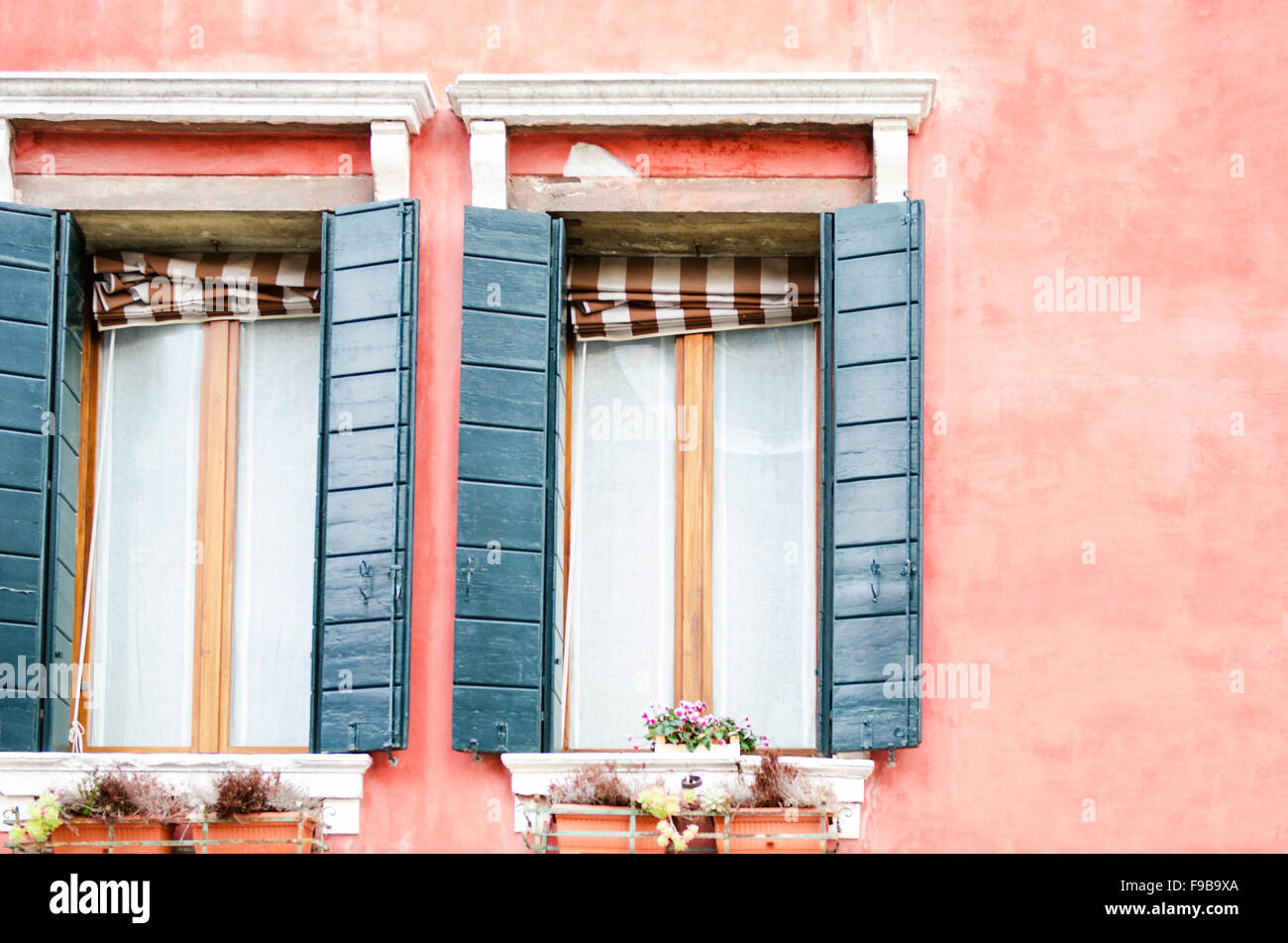 Windows in a house in Venice Stock Photo - Alamy