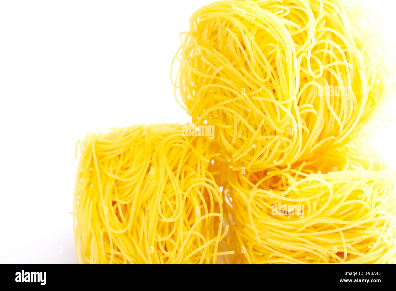 dried italian pasta (macaroni) isolated on white background Stock Photo ...